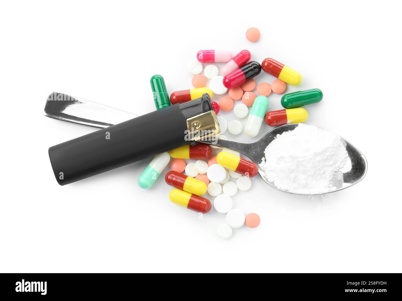 Drug addiction. Different pills, spoon with powder and cigarette ...