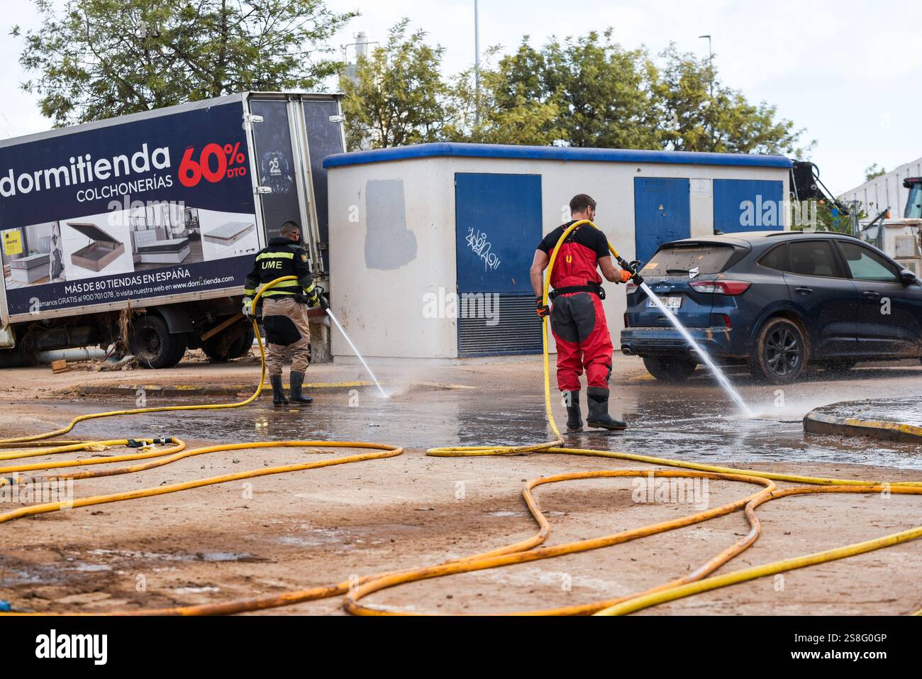 UME members (Emergency Military Unit) during cleanup operations of a ...