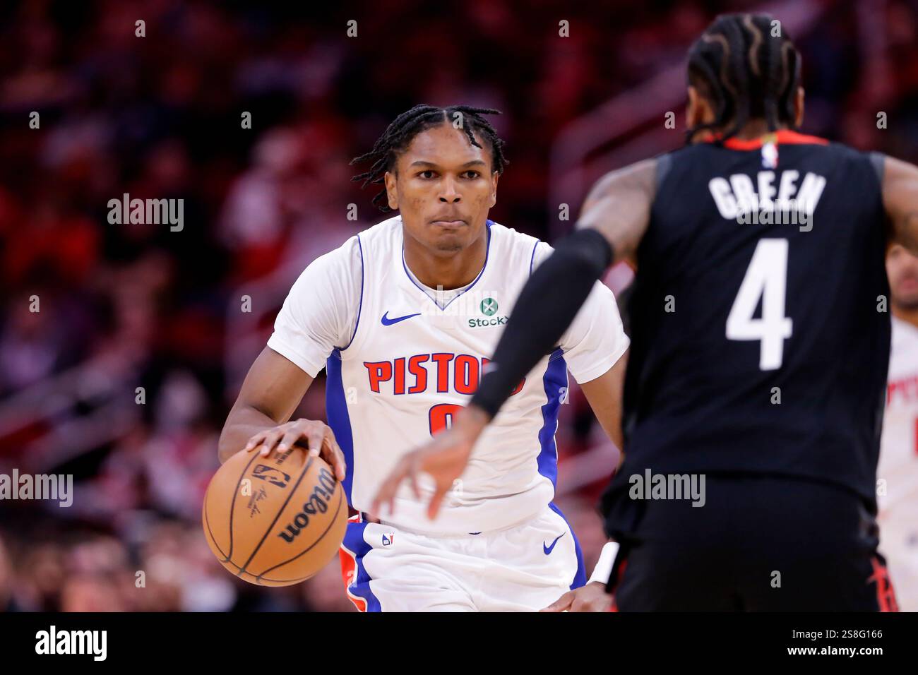 Detroit Pistons forward Ausar Thompson, left, looks to drive around ...
