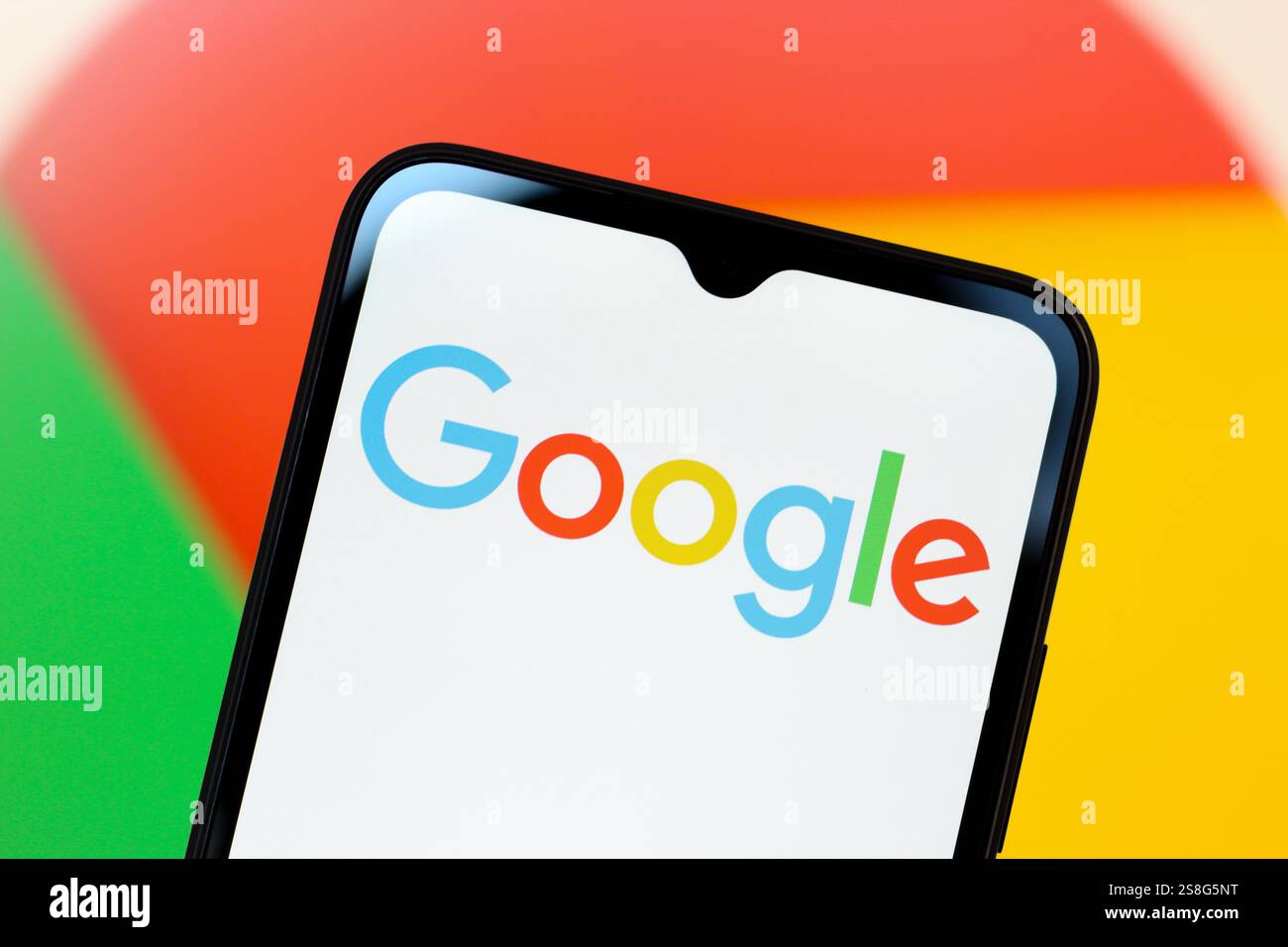 In this photo illustration, the Google logo is seen displayed on a ...