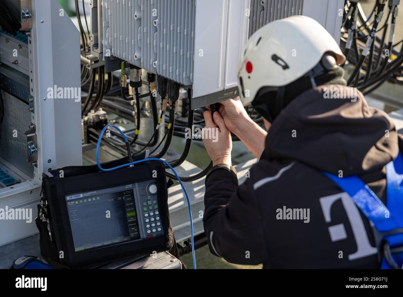 Nuremberg, Germany. 21st Jan, 2025. A Deutsche Telekom technician ...