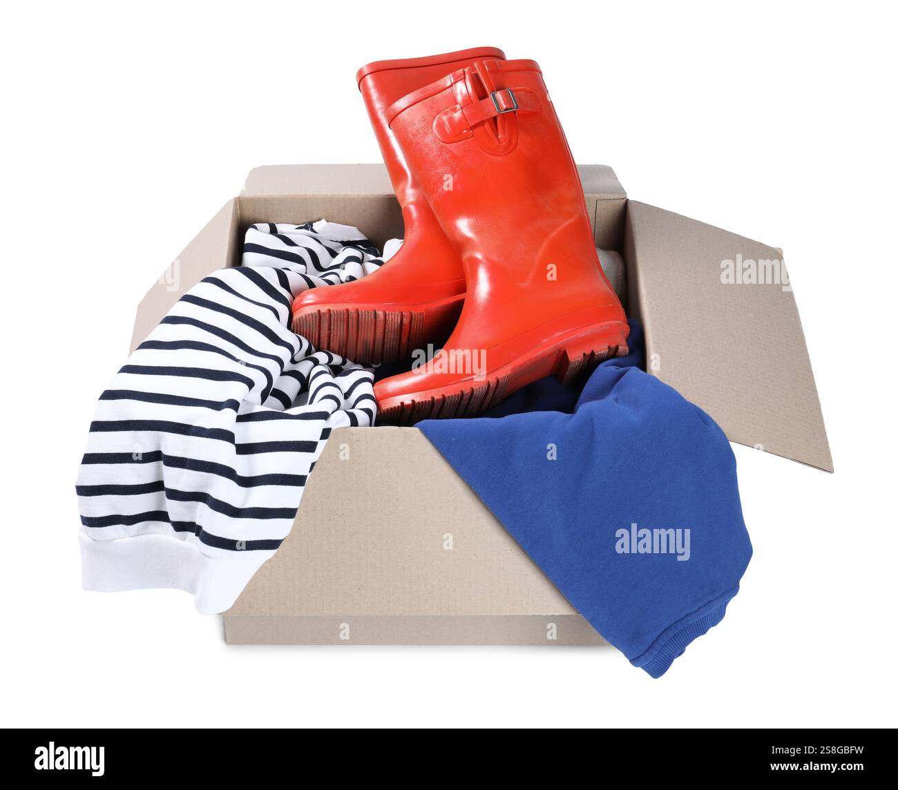 Different used clothes and boots in box isolated on white Stock Photo ...