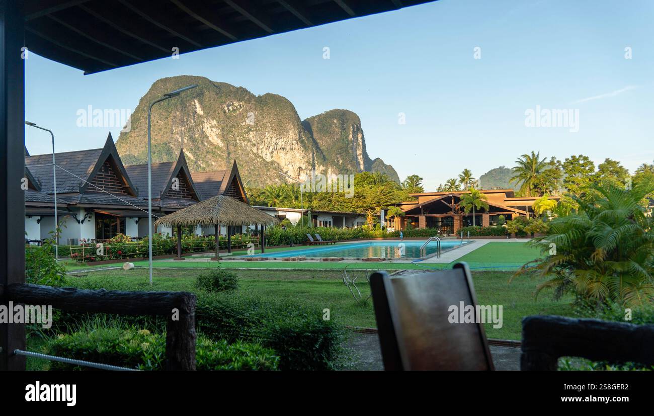 asian huts in rural thailand with a mountain Stock Photo - Alamy