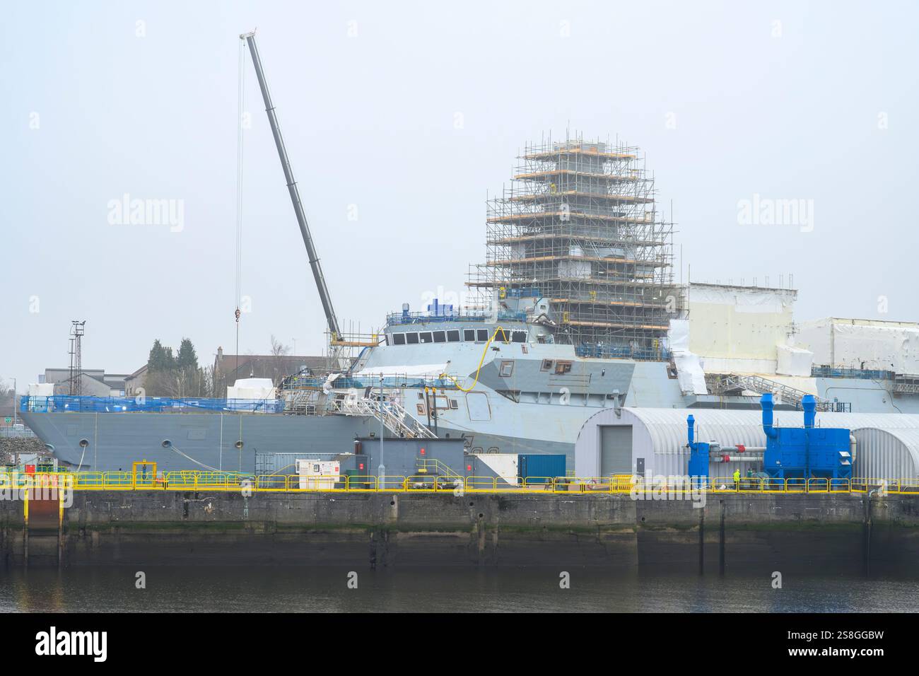 A frigate being fitted out at BAE Systems Scotstoun yard, Glasgow ...