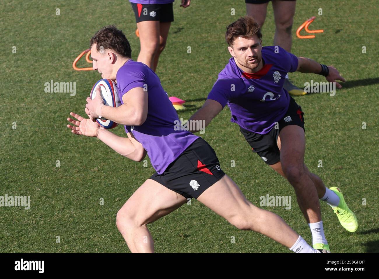 Girona, Spain, 22nd January 2025 - Oscar Beard running past Henry Slade ...