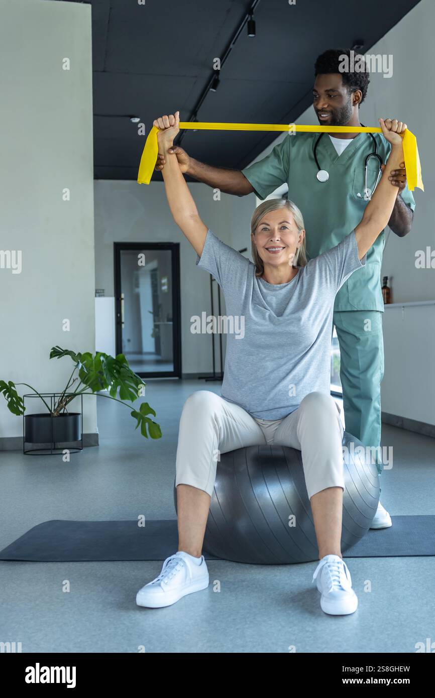 Man providing rehabilitation treatment and consulting patients for ...