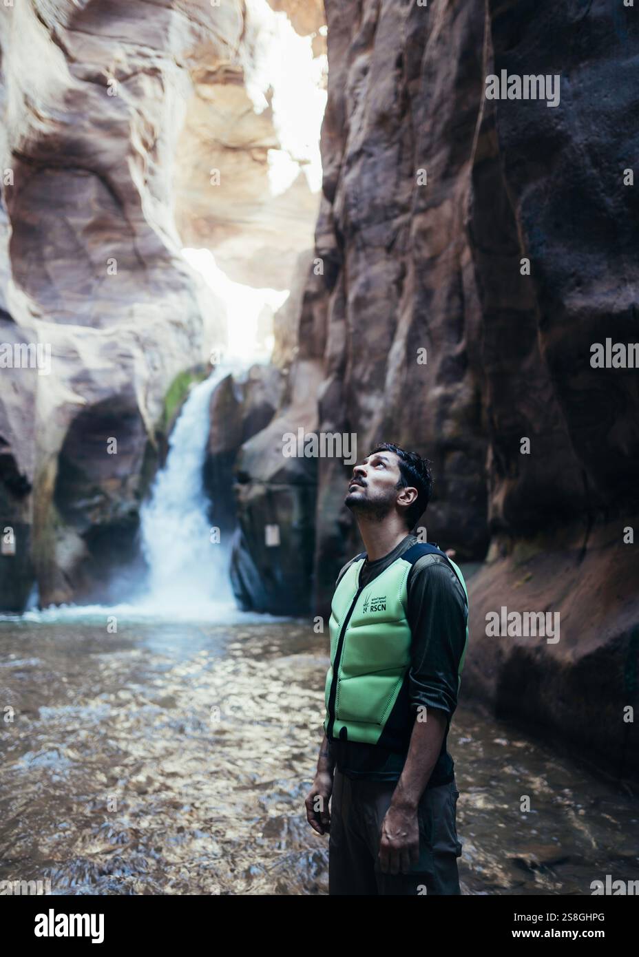 Tourist on a hike on the famous Wadi Mujib Siq Trail in Jordan Stock ...