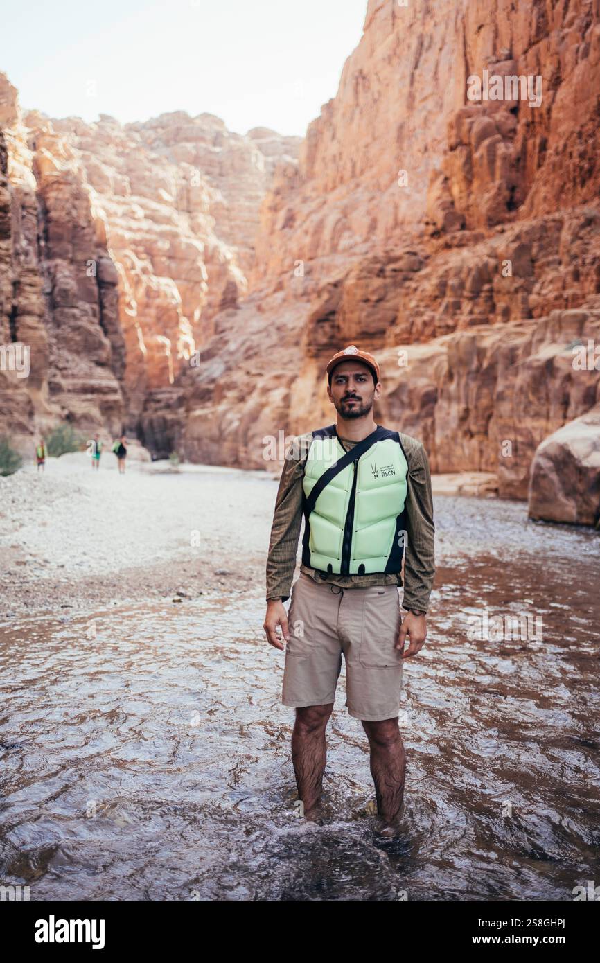 Tourist on a hike on the famous Wadi Mujib Siq Trail in Jordan Stock ...