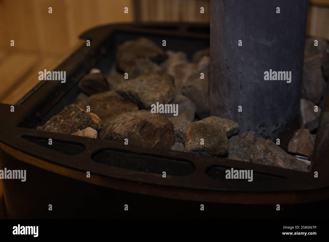 Stove with hot rocks in sauna, closeup Stock Photo - Alamy