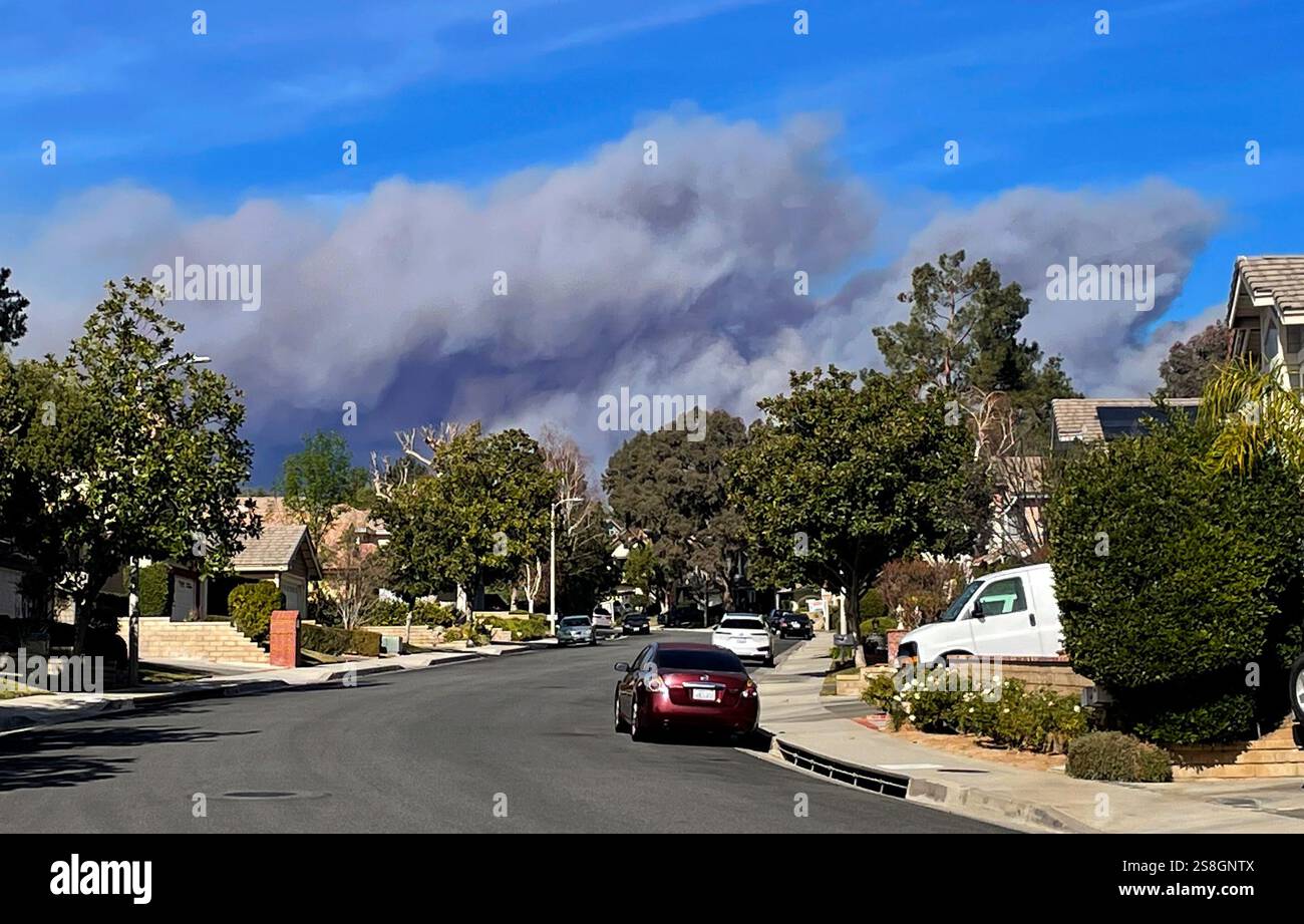 A large plume of smoke caused by the Hughes Fire rises from Castaic ...