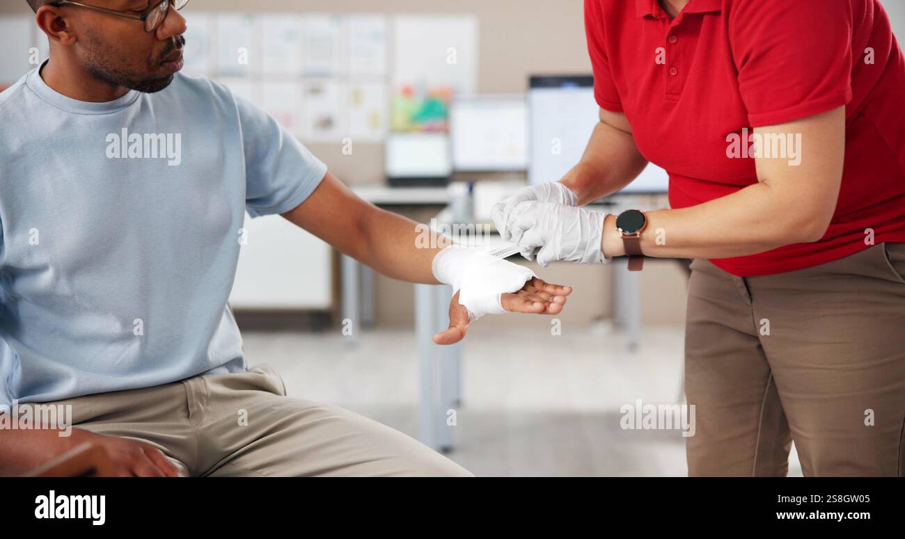 Hands, people and first aid with bandage, teaching or tutorial with ...