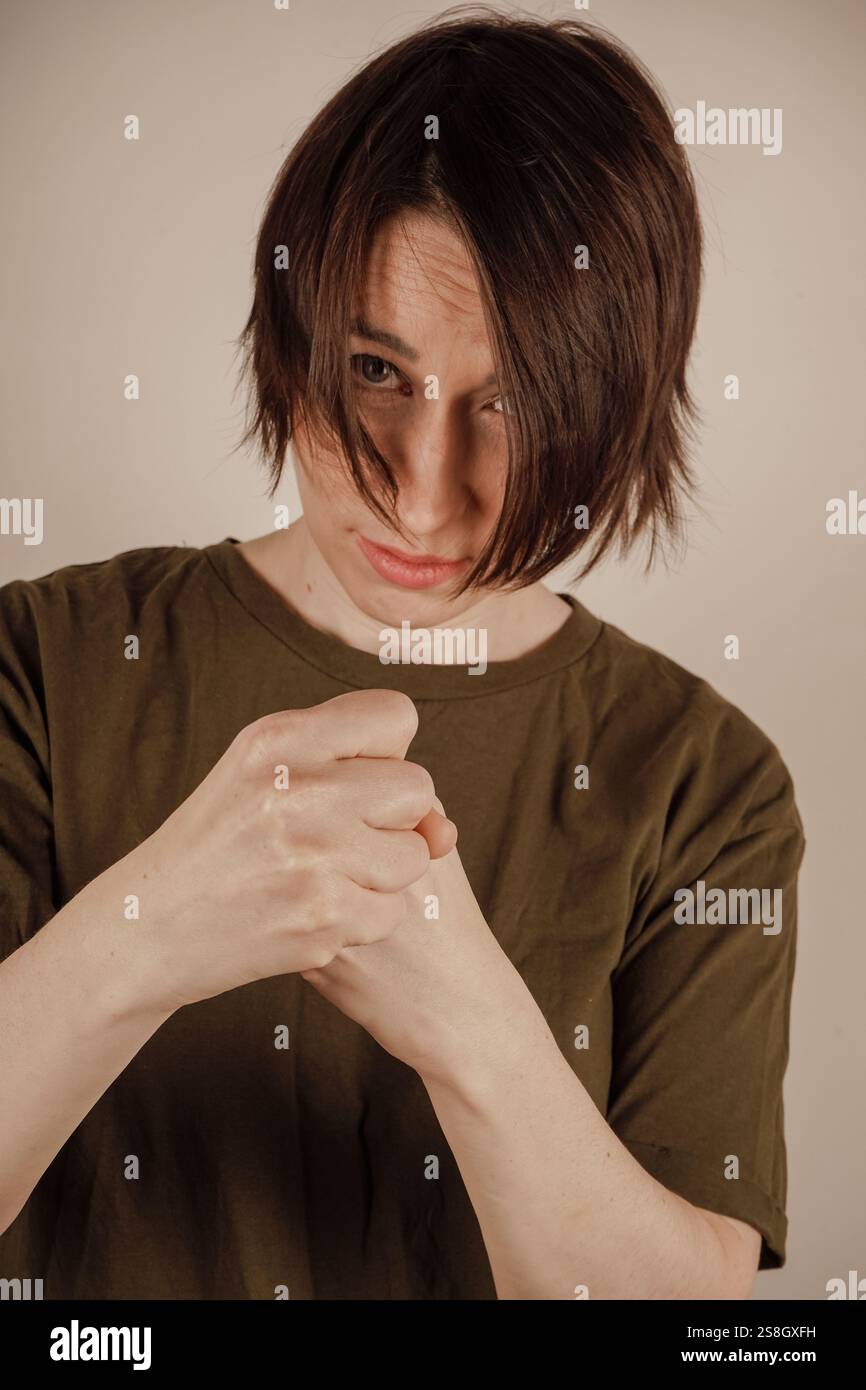 An offended person looks cute when he is angry. Portrait of outraged ...