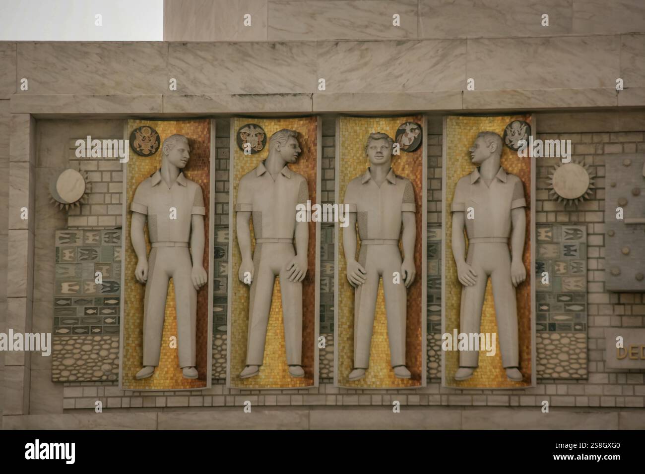 Sculpture on side of building Stock Photo - Alamy