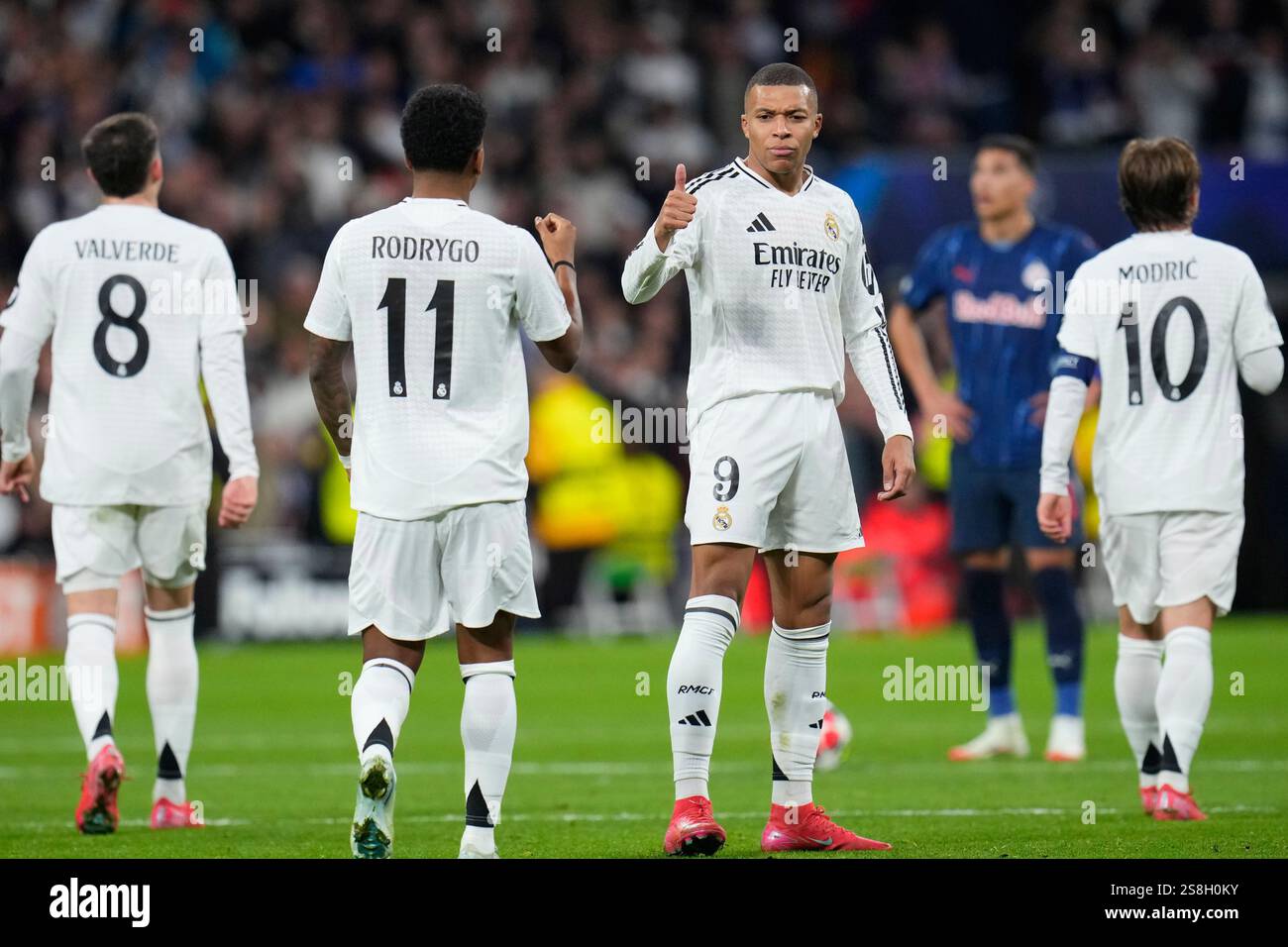 Real Madrid's Rodrygo, second from left, celebrates with his teammate ...