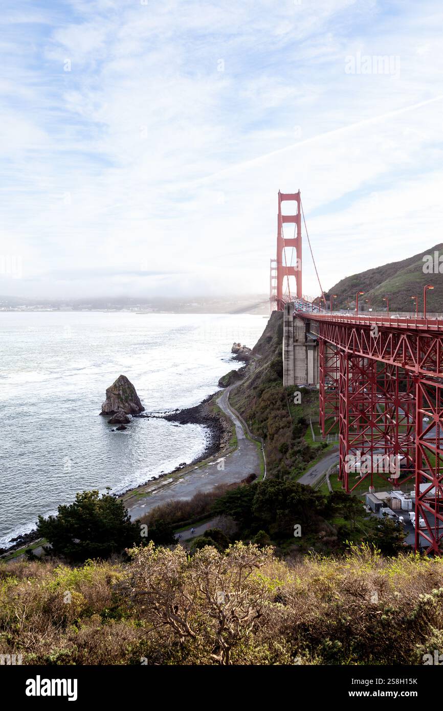 Golden Gate Bridge stretches majestically over the bay, surrounded by ...