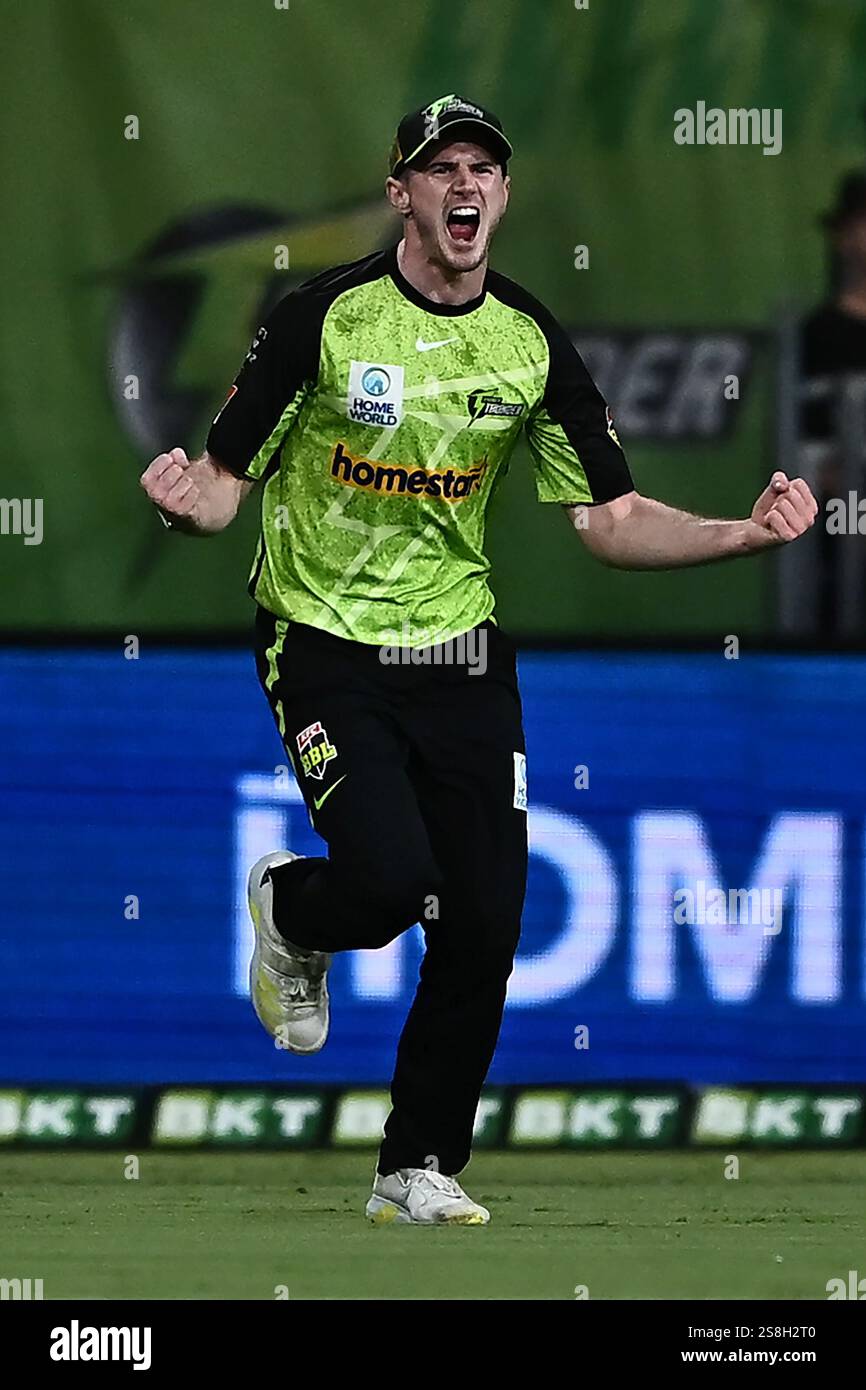 George Garton of Sydney Thunder celebrates after taking the catch to ...