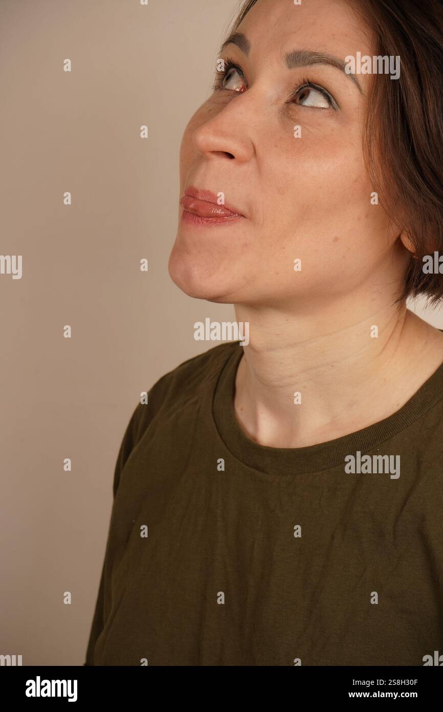 Woman shows tongue folded tube hi-res stock photography and images - Alamy