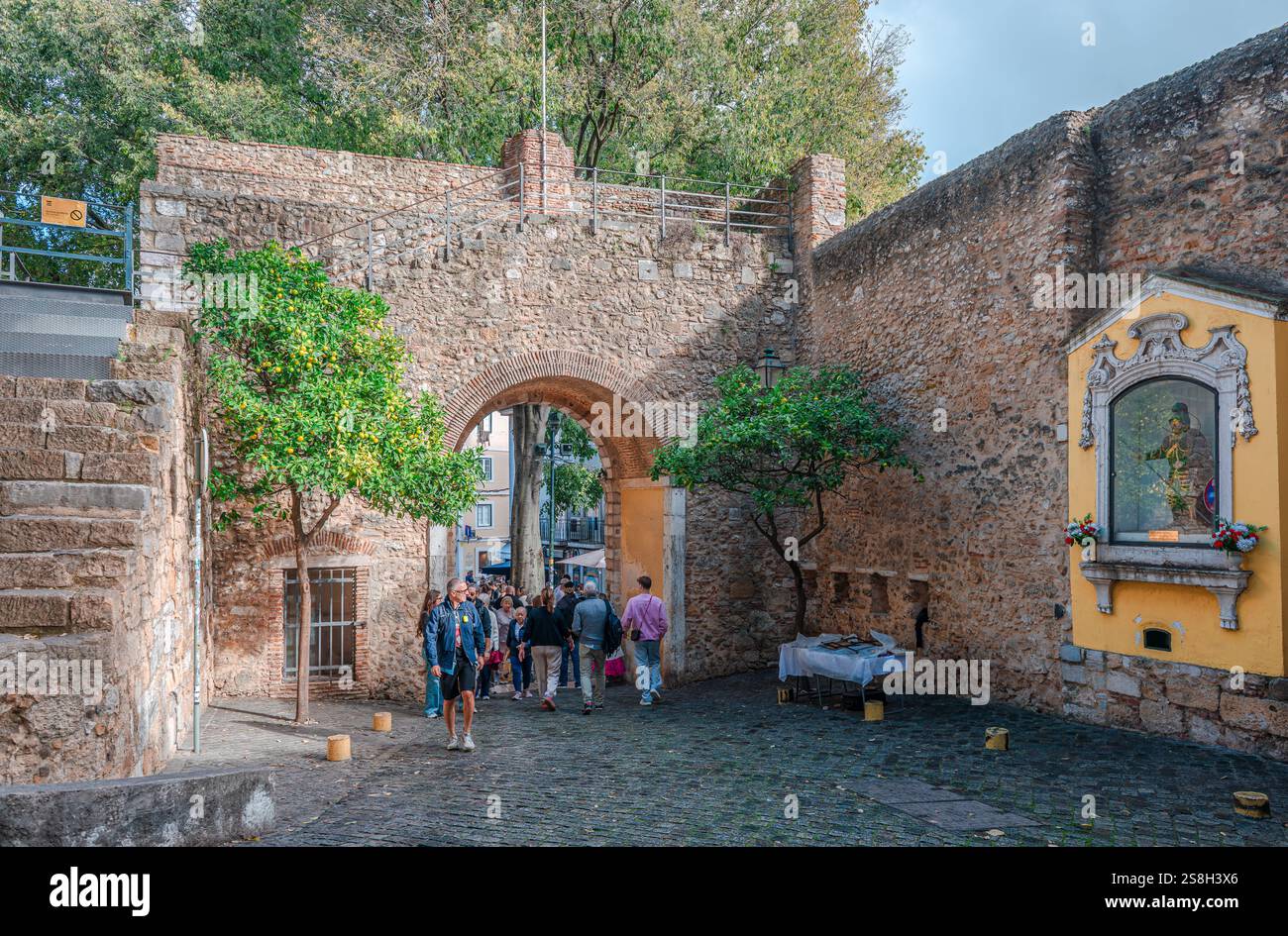 The arched entrance gate to Sao Jorge Castle, in Lisbon, Portugal ...