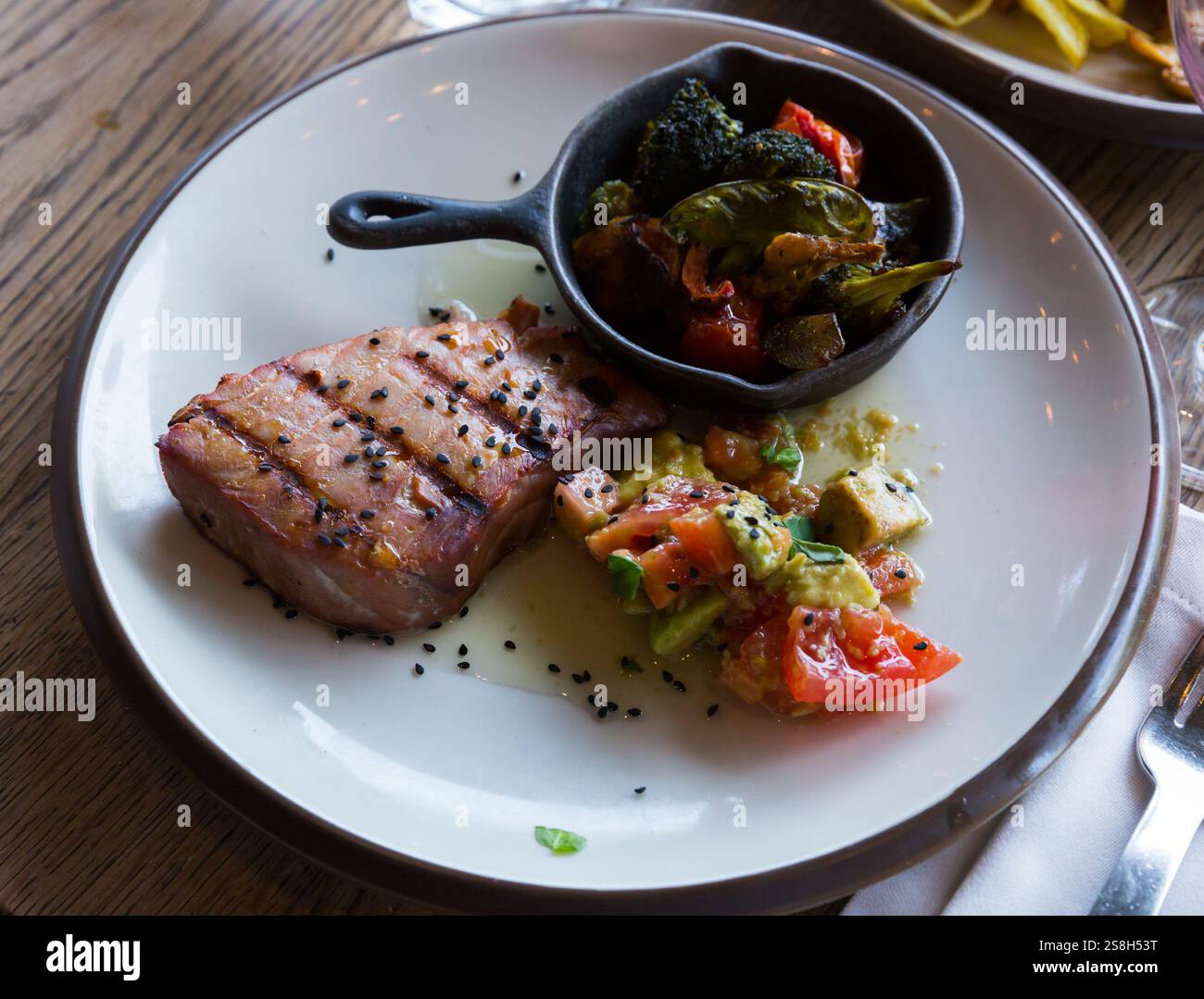Braised tuna fillet with vegetables Stock Photo - Alamy