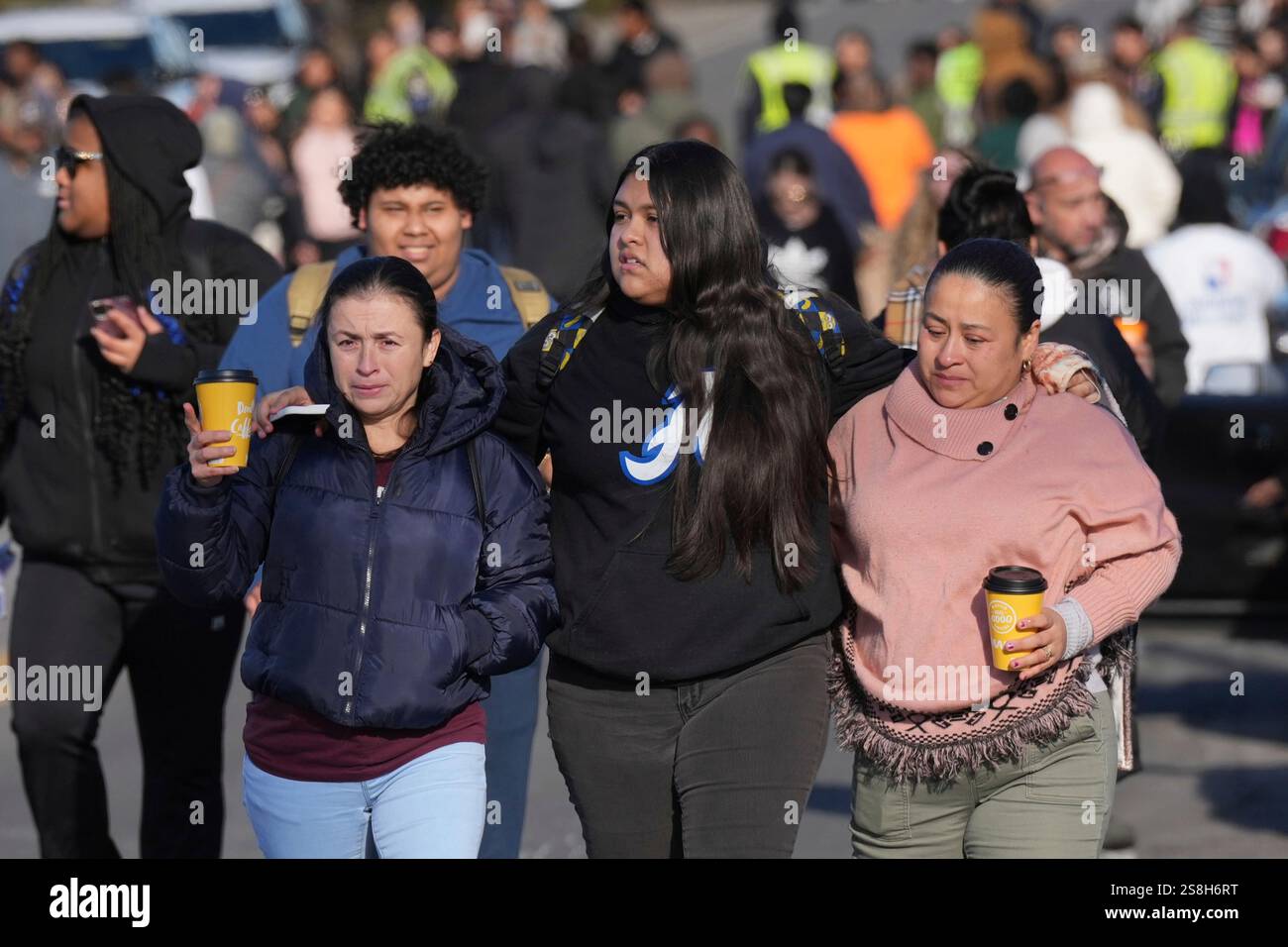 Students and family walk from the Antioch High School after a shooting ...