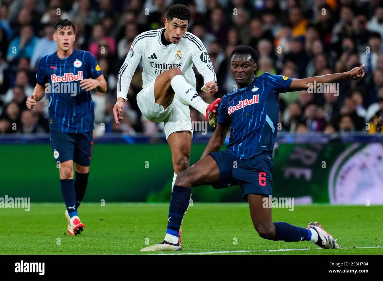 Jude Bellingham of Real Madrid CF and Samson Baidoo of FC Salzburg ...