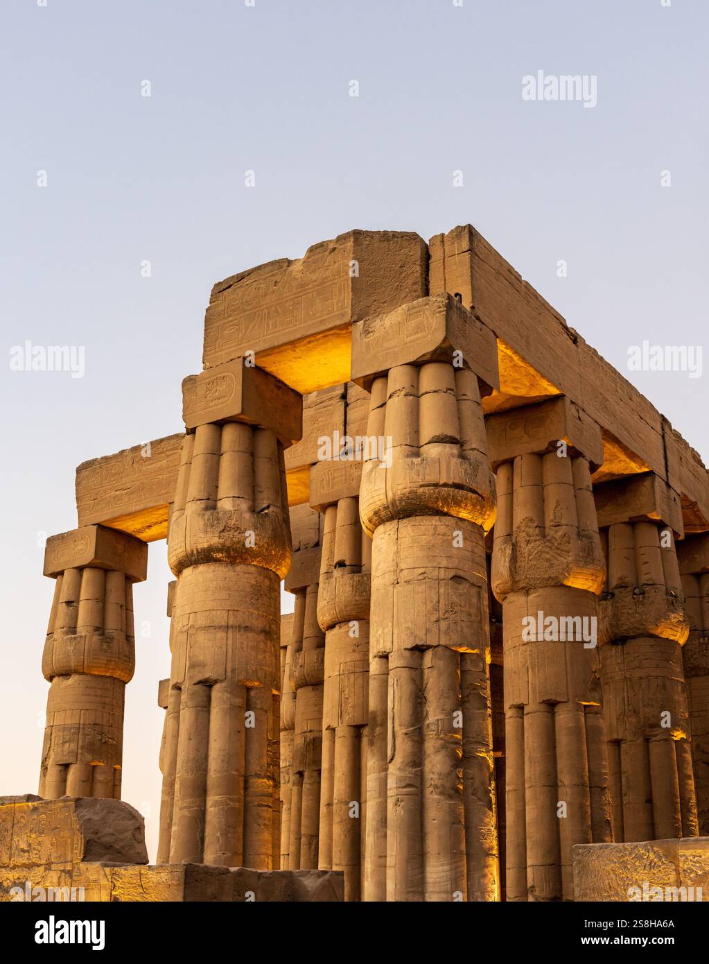 Massive numerous stone columns supporting roof of Luxor Temple in Egypt ...