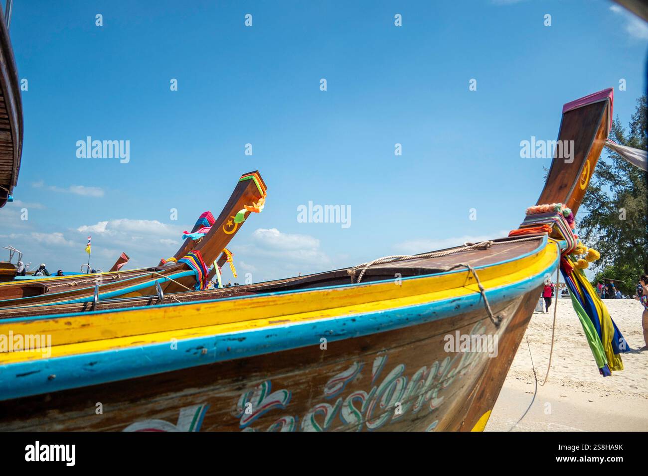 Scenic boat ride under towering limestone cliffs in Thailand's stunning ...