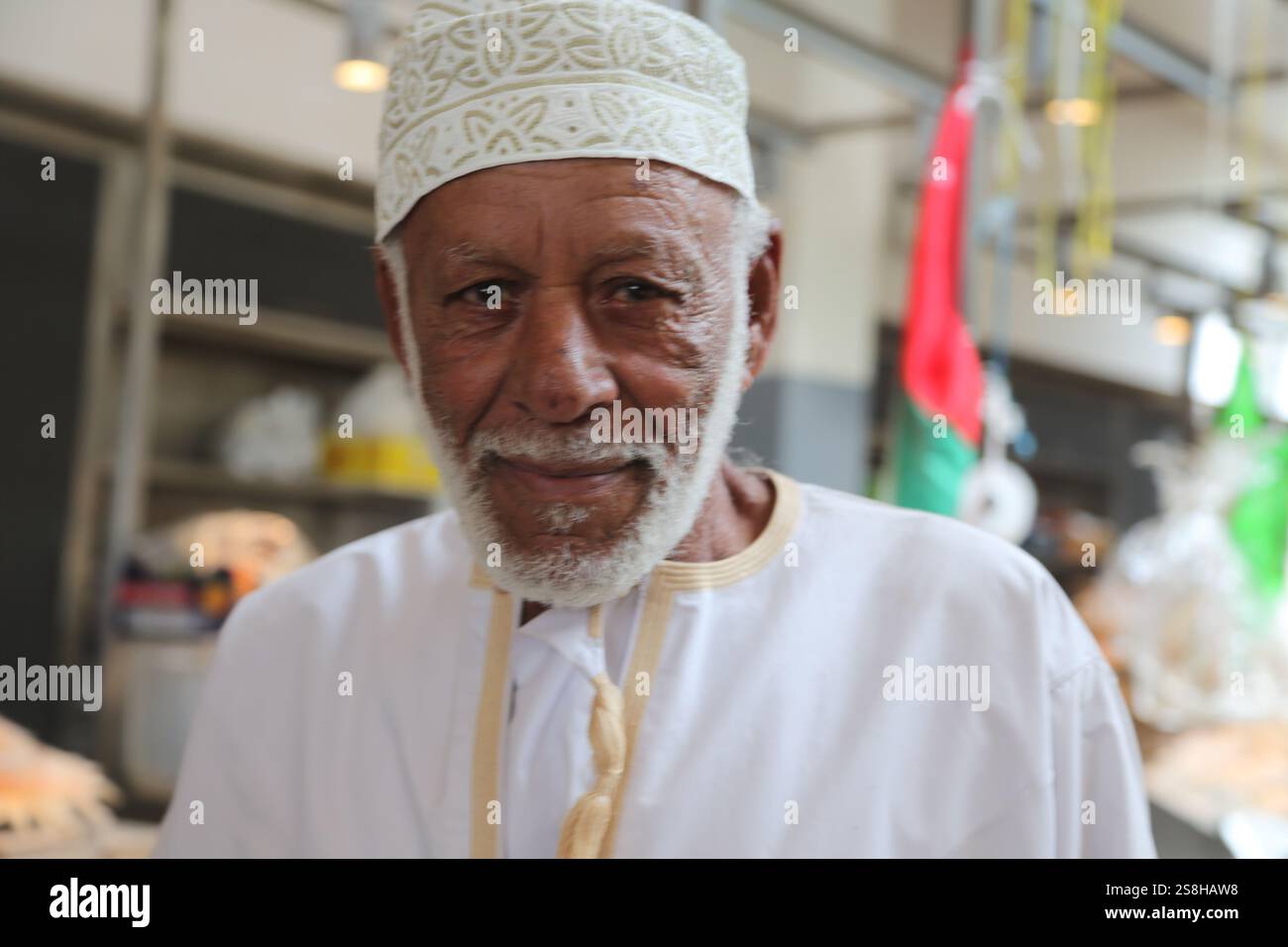 Portrait of Omani Man Wearing Traditional Kuma and Dishdasha at Mutrah ...