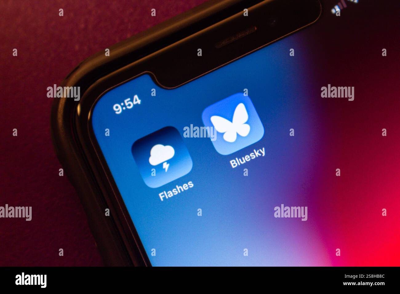 Flashes and Bluesky Social logos are shown on an iPhone. Flashes app is ...