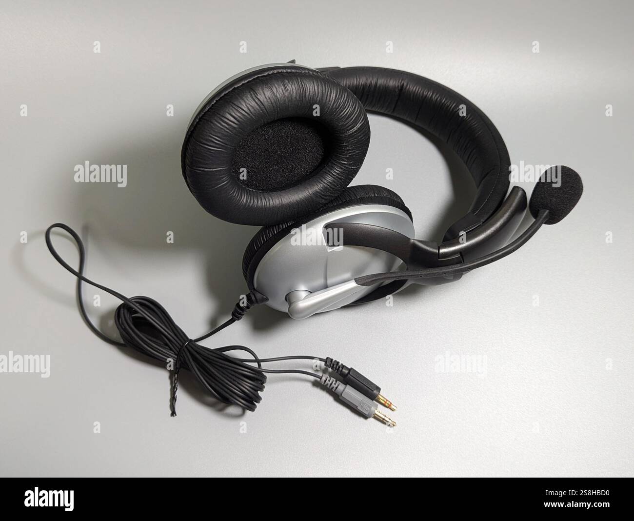 Typical gaming headset on a grey surface Stock Photo - Alamy