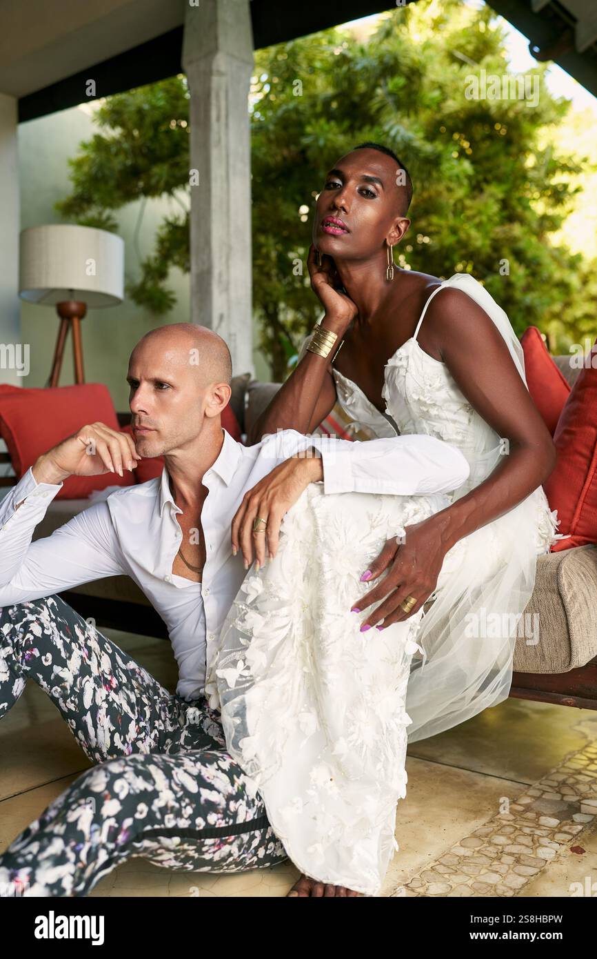 Ambiguous gender fluid black person in white bride dress with lgbtq ...