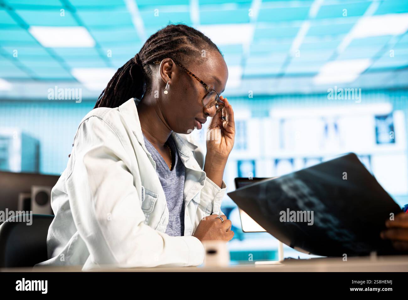 Radiologist delivering bad news about a tumor during a medical ...