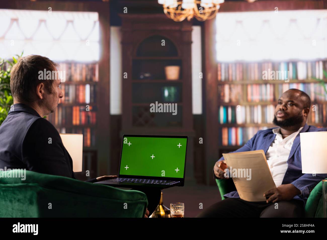 Multiethnic secret agents discussing next to isolated copy space on ...