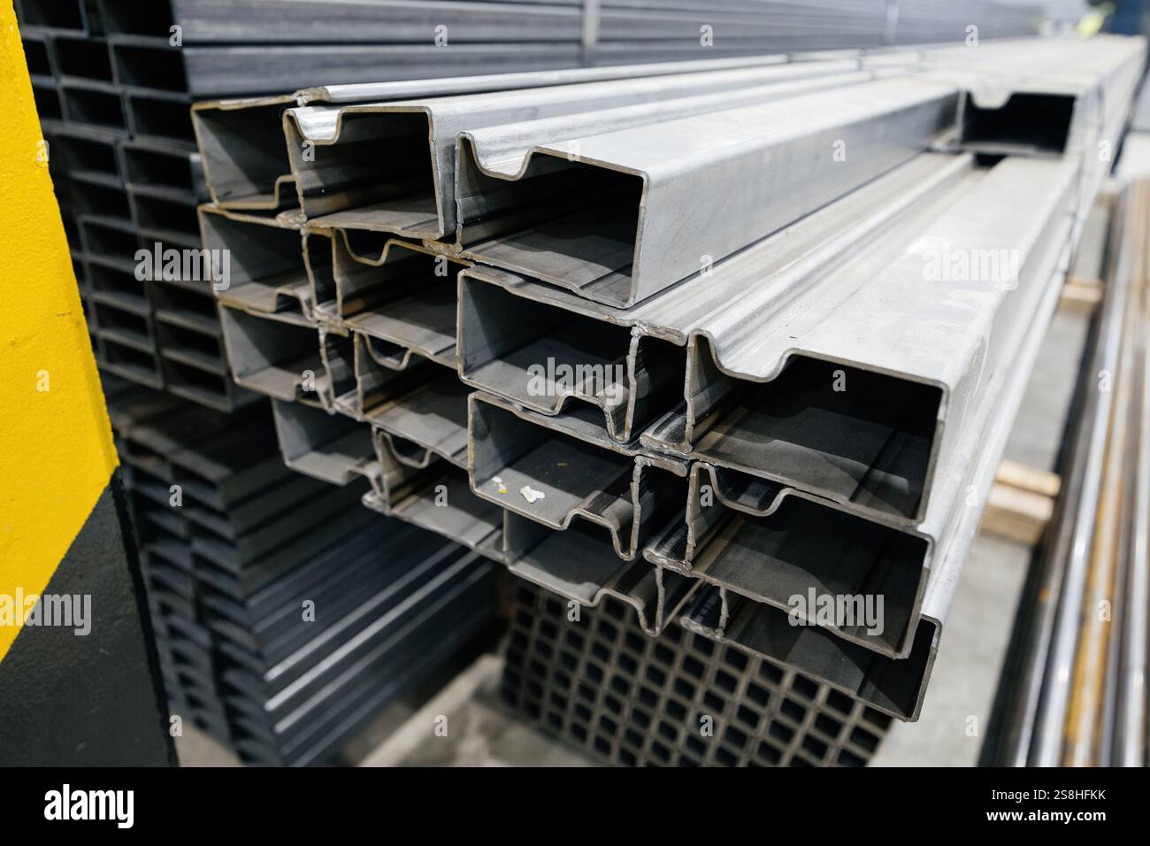 Metal profiled parts in pack, close up Stock Photo - Alamy