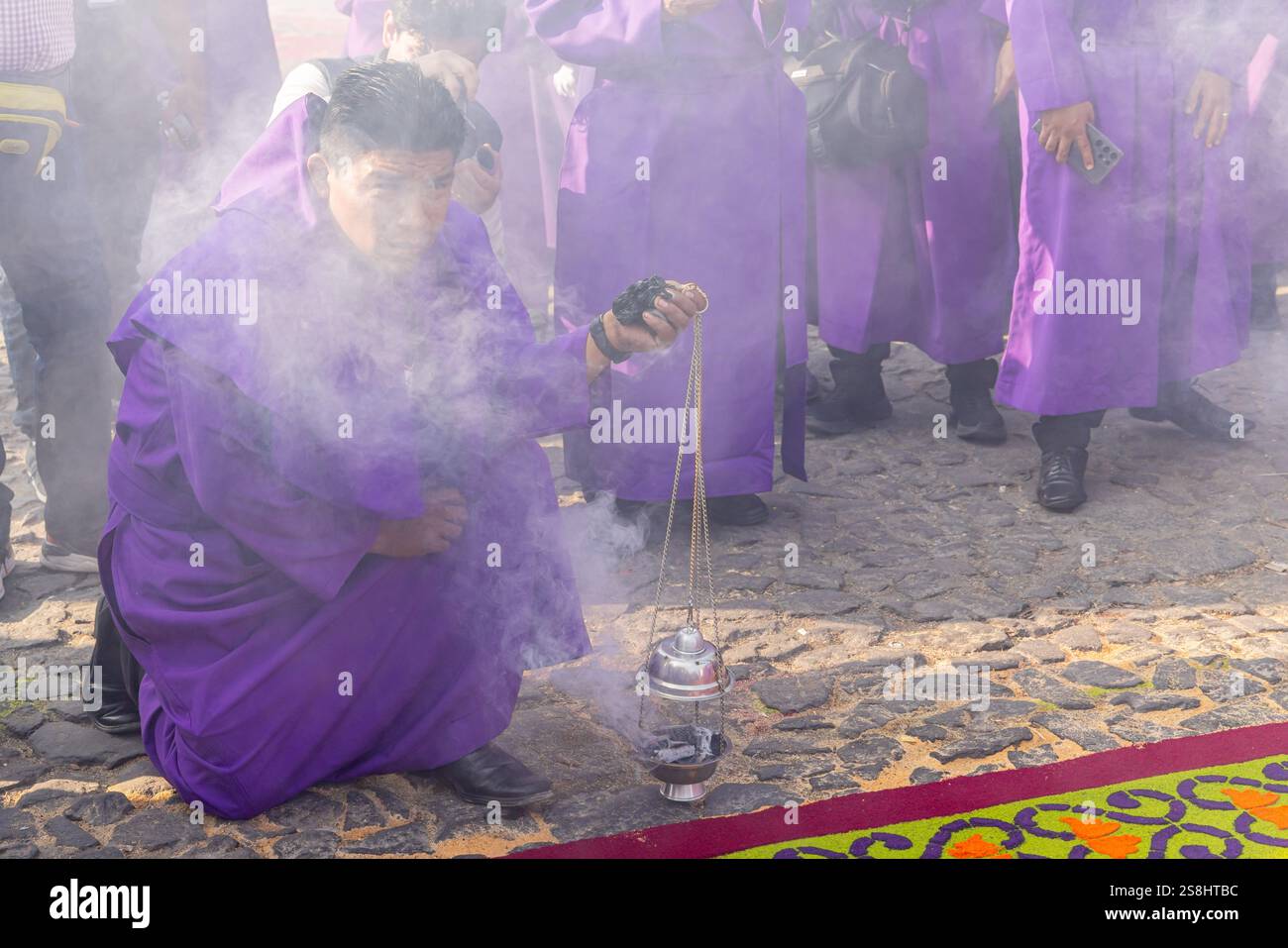 Antigua Guatemala, Sacatepequez, Guatemala. March 10, 2024. Man burning ...