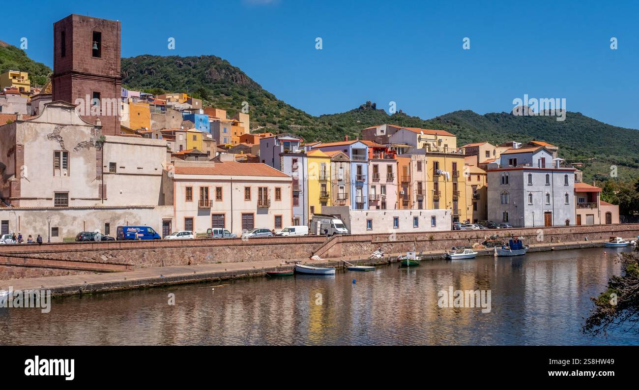 View of houses on the Temo river and church tower, Bosa, Europe ...