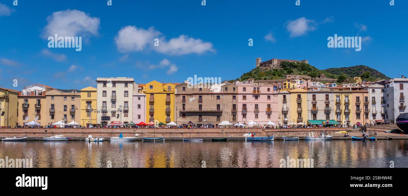 Panoramic photo with houses and promenade at the river Temo, guests at ...