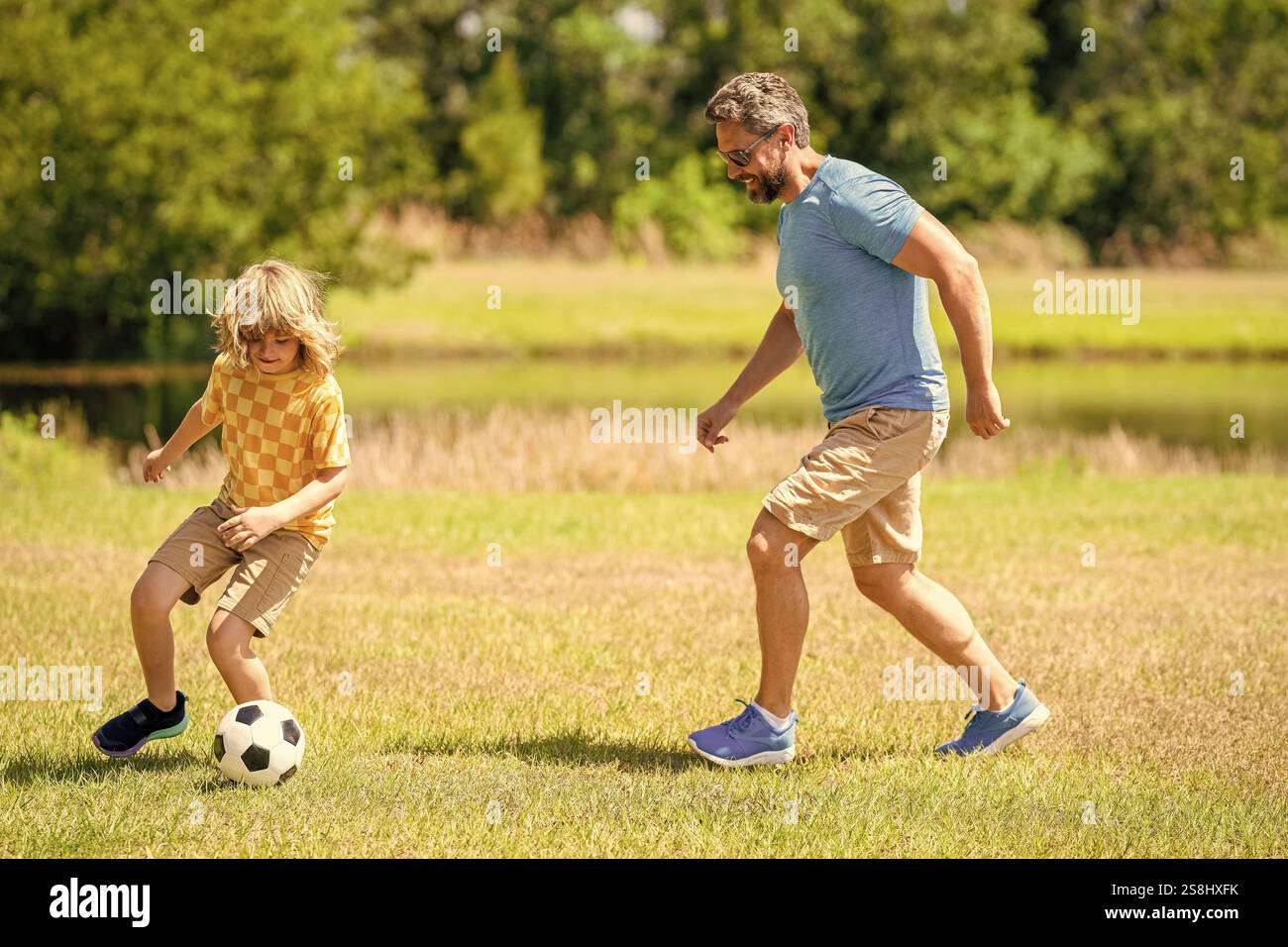 Father dad and son enjoying outdoor activities together. Outdoor ...