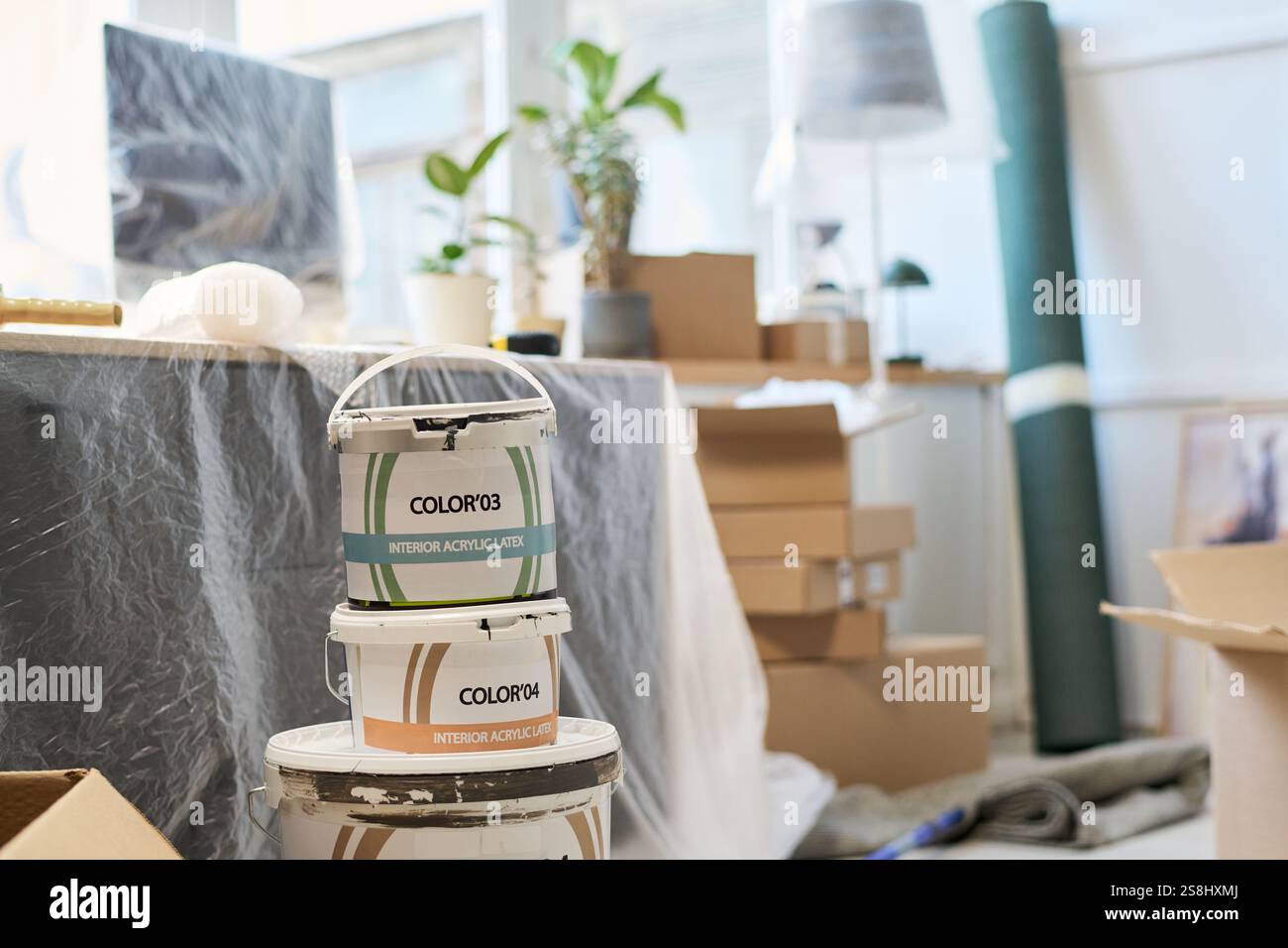 Stack of plastic buckets with paint for floor or walls of domestic room ...