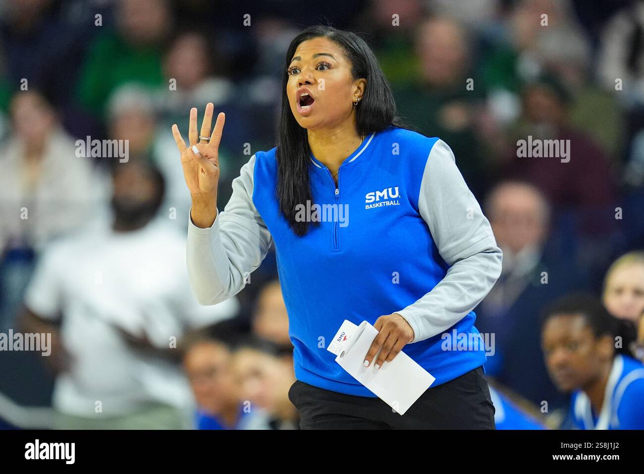 SMU head coach Toyelle Wilson gestures in the first half of an NCAA ...
