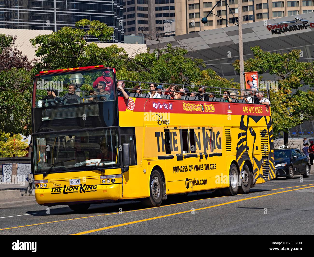 Toronto Canada / A Toronto Sightseeing tour Bus transports tourists to ...