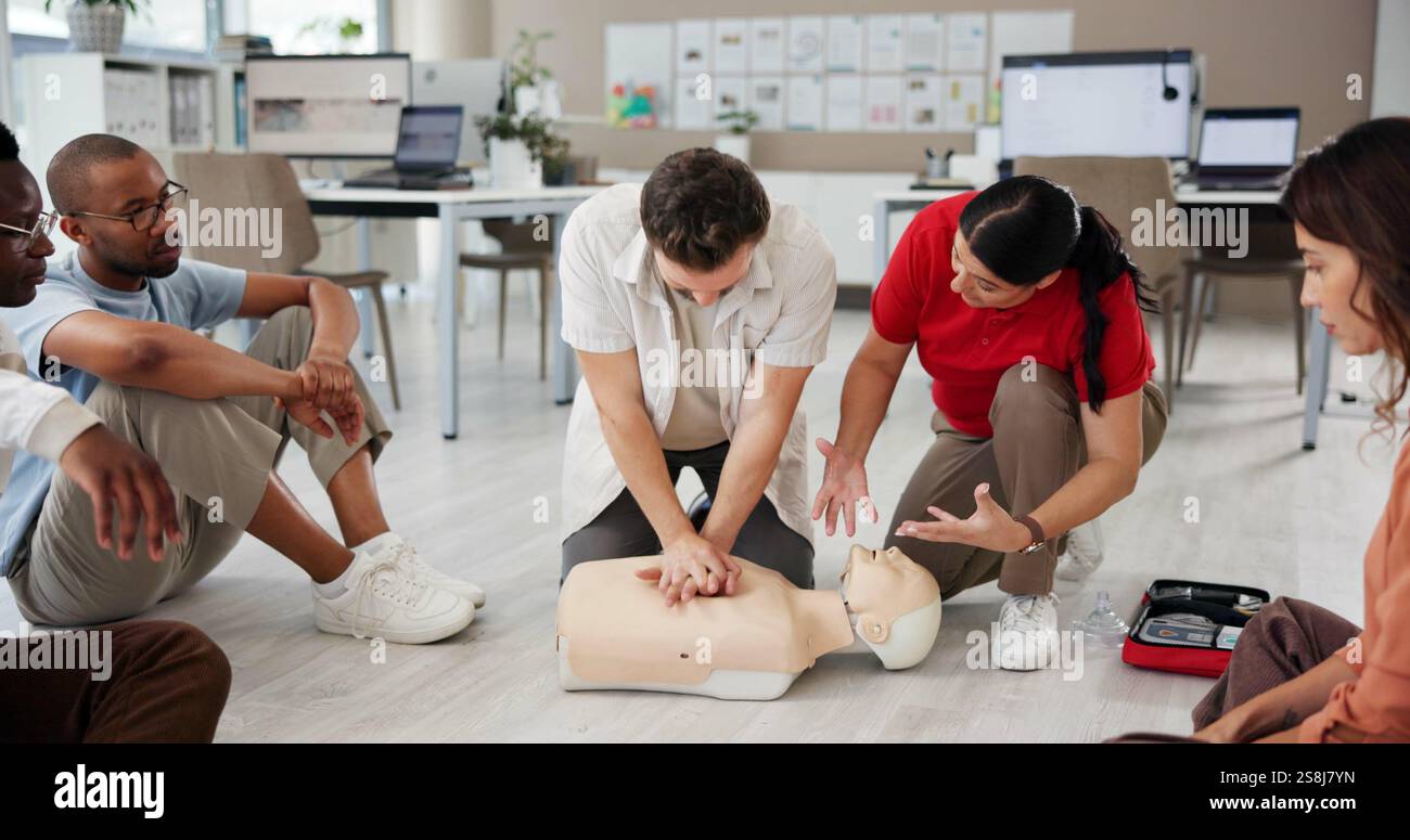 First aid, learning cpr and group with dummy for safety compliance ...