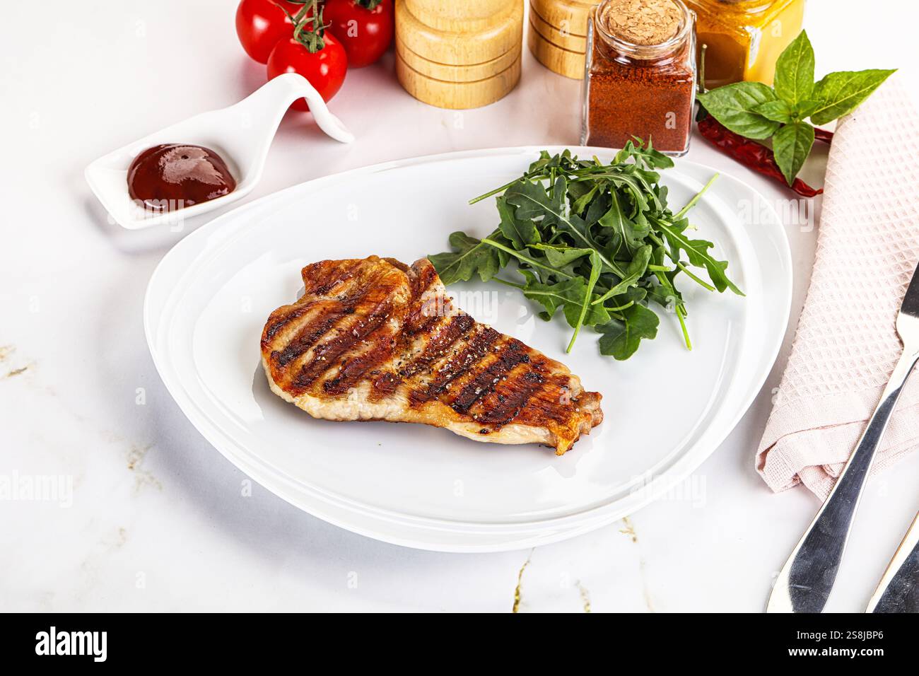 Delicous grilled pork meat steak with sauce Stock Photo - Alamy