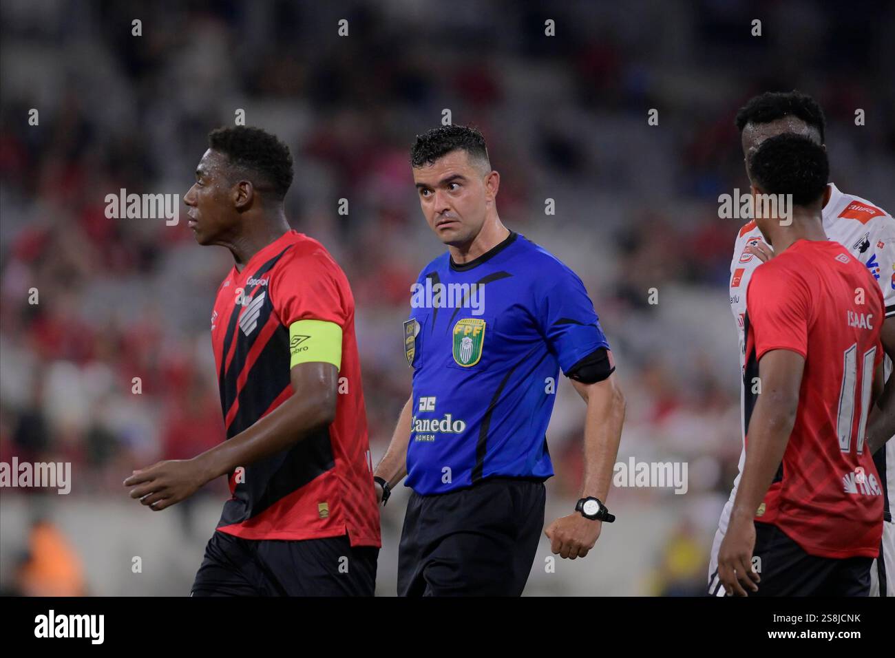 Curitiba, Brazil. 22nd Jan, 2025. Léo and Referee Andre Ricardo Martins ...
