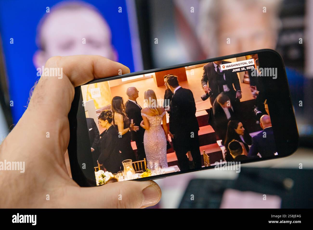 Paris, France - Jan 20, 2025: A hand holding a smartphone showing live ...
