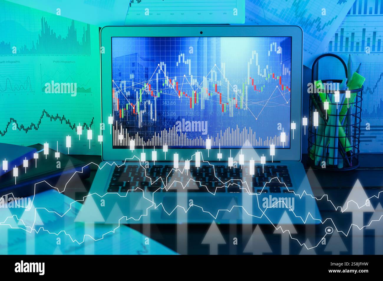 Laptop with diagram of exchange rates on virtual screen Stock Photo - Alamy