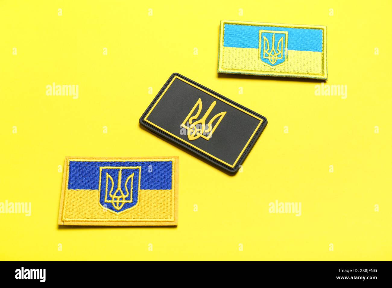 Different military badges of Ukrainian army with trident on yellow ...