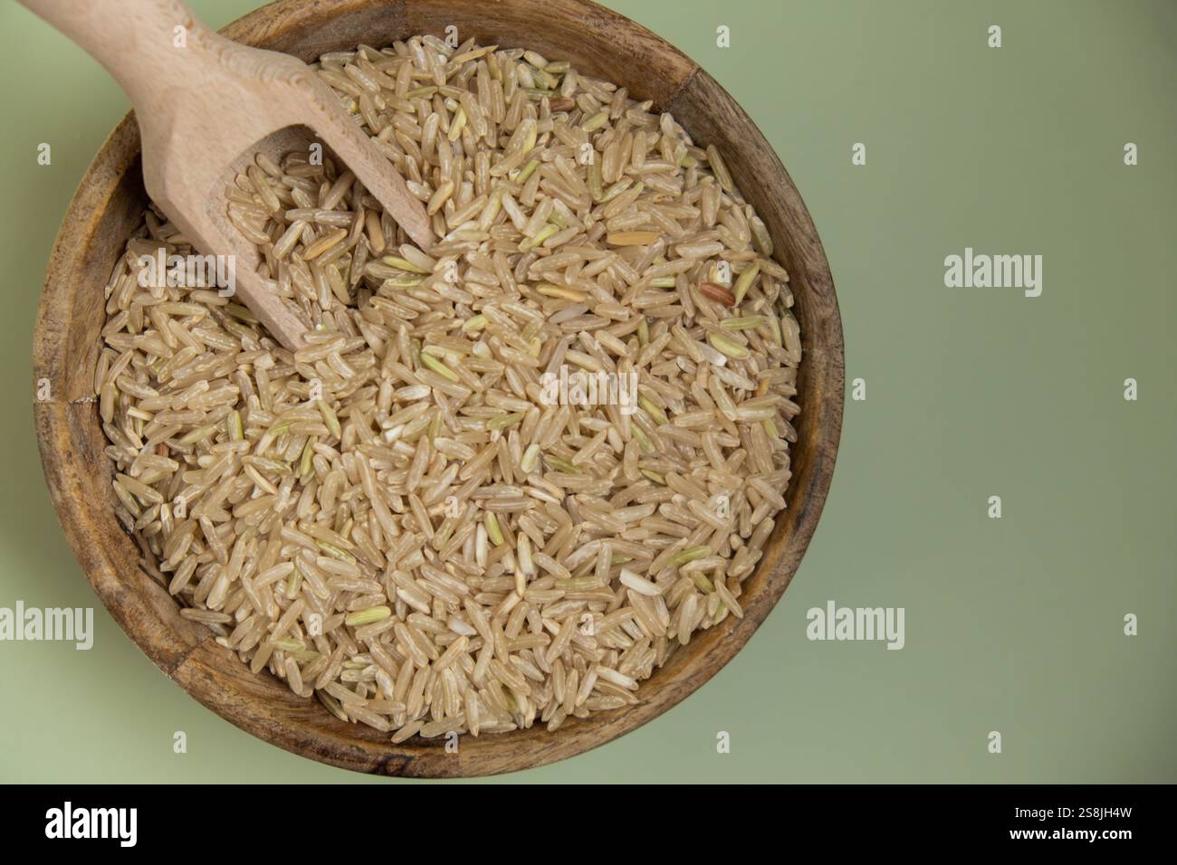 Raw brown rice Gluten free cereals. Health gut benefits. Concept of ...