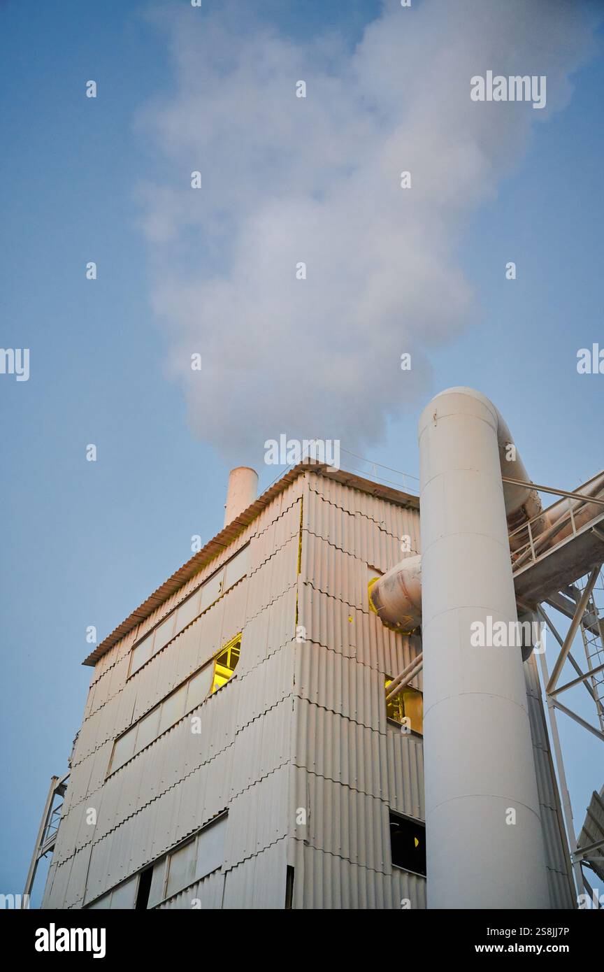 Building of loading device of roasting rotary furnace Stock Photo - Alamy