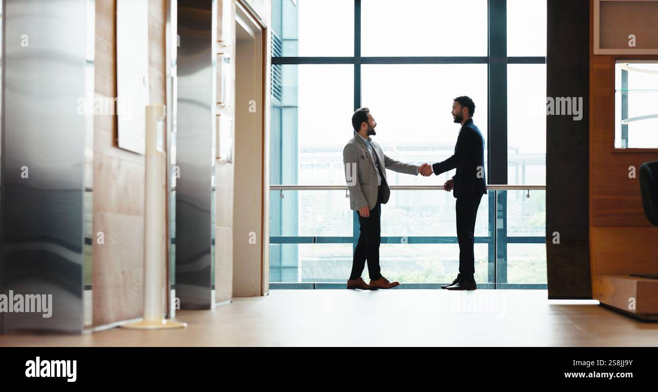 Business, men and shaking hands in office for meeting, b2b partnership and greeting for ...